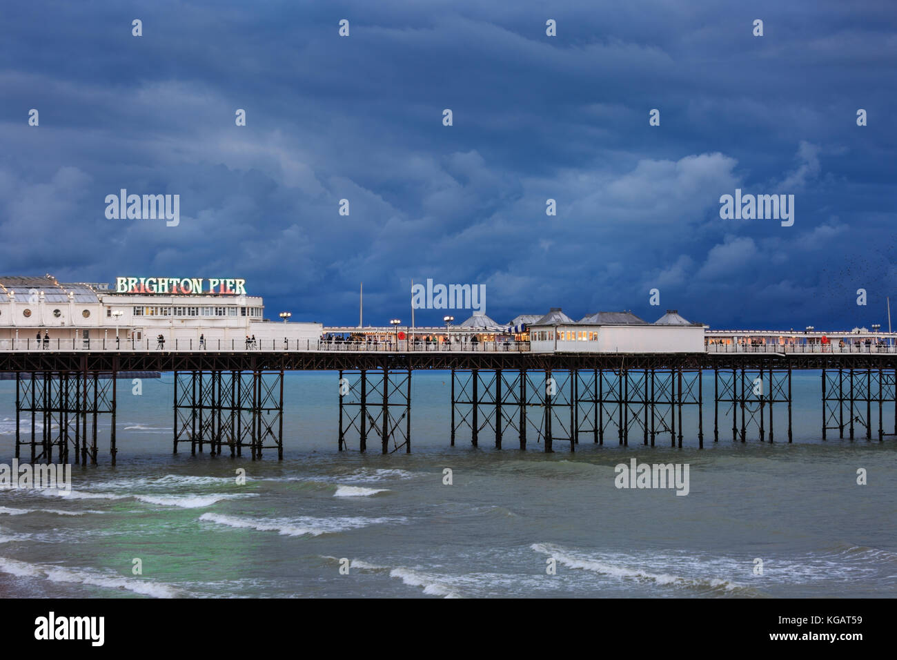Brighton Pier Victorian pleasure pier, dramatic sky and sea Stock Photo ...