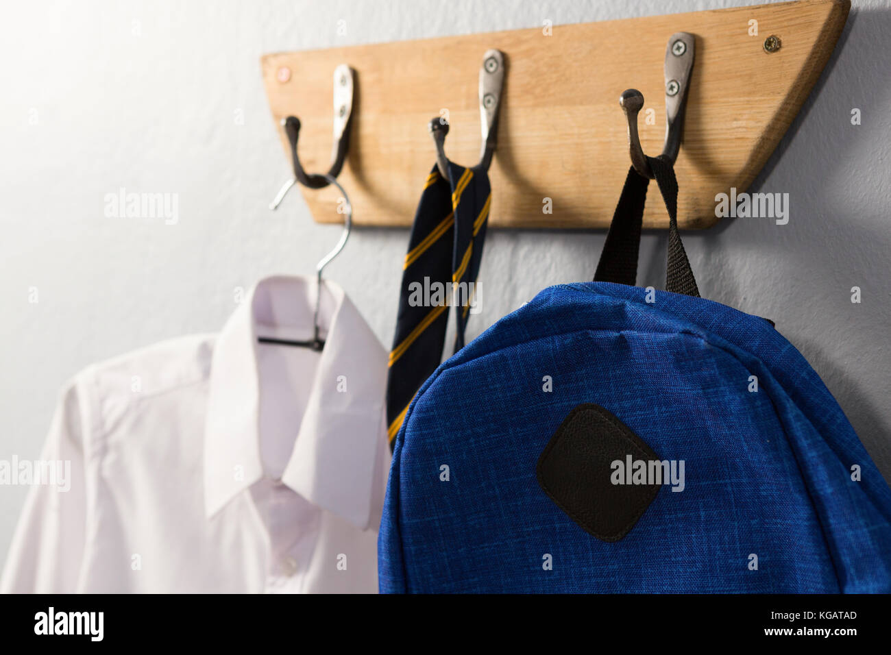 School uniform schoolbag hanging hook hi-res stock photography and ...