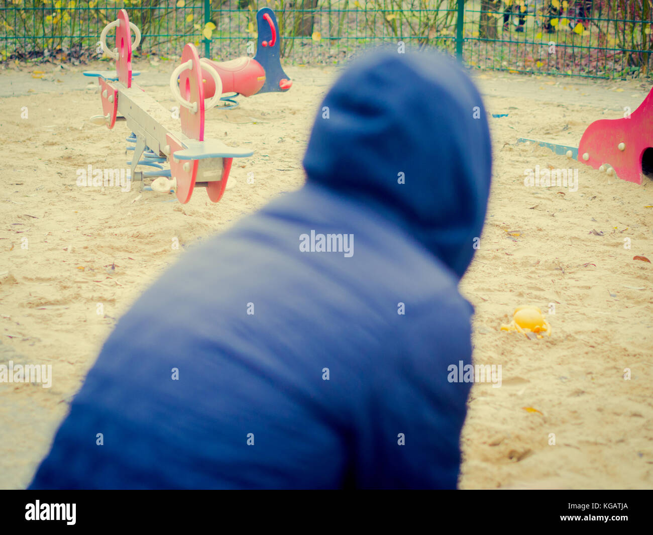 Man playground children looking hi-res stock photography and images - Alamy