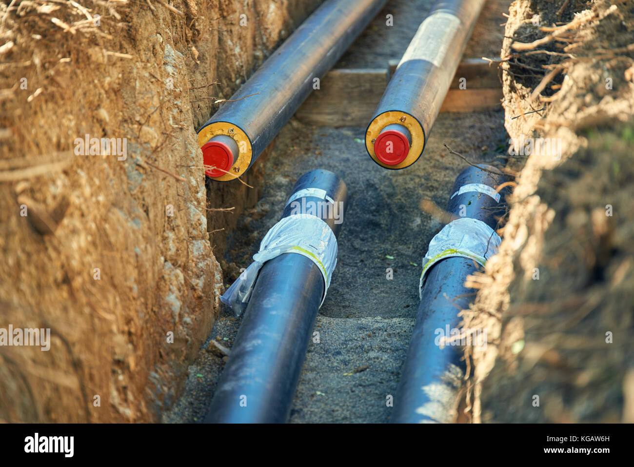 District heating - connecting insulated pipes Stock Photo - Alamy