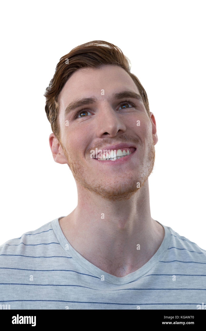 Smiling male executive standing against white background Stock Photo ...