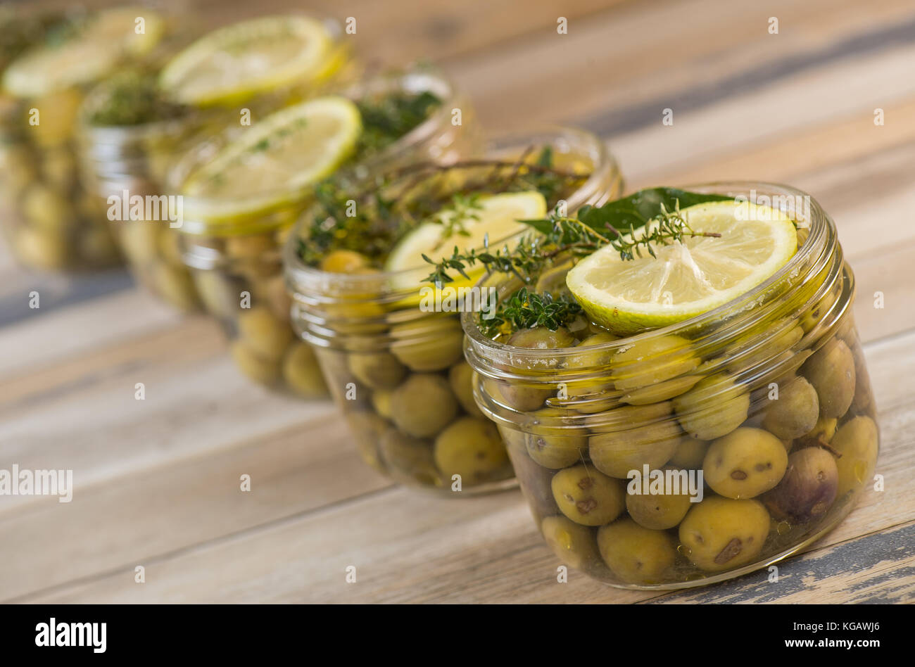 Green olives preserved in jar, preserve Stock Photo - Alamy