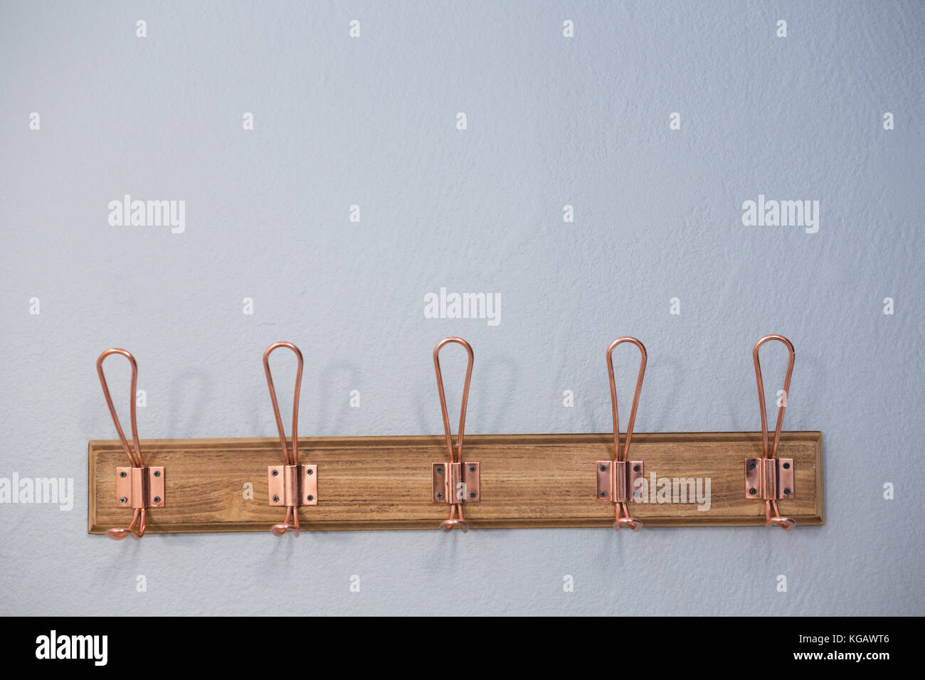 Close-up of hook attached on wall Stock Photo - Alamy