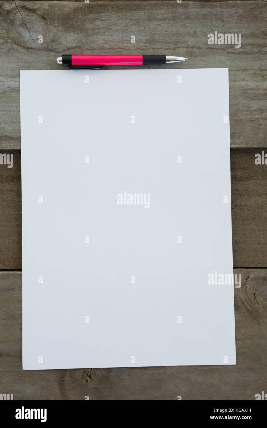 Blank paper and pen on wooden plank Stock Photo - Alamy