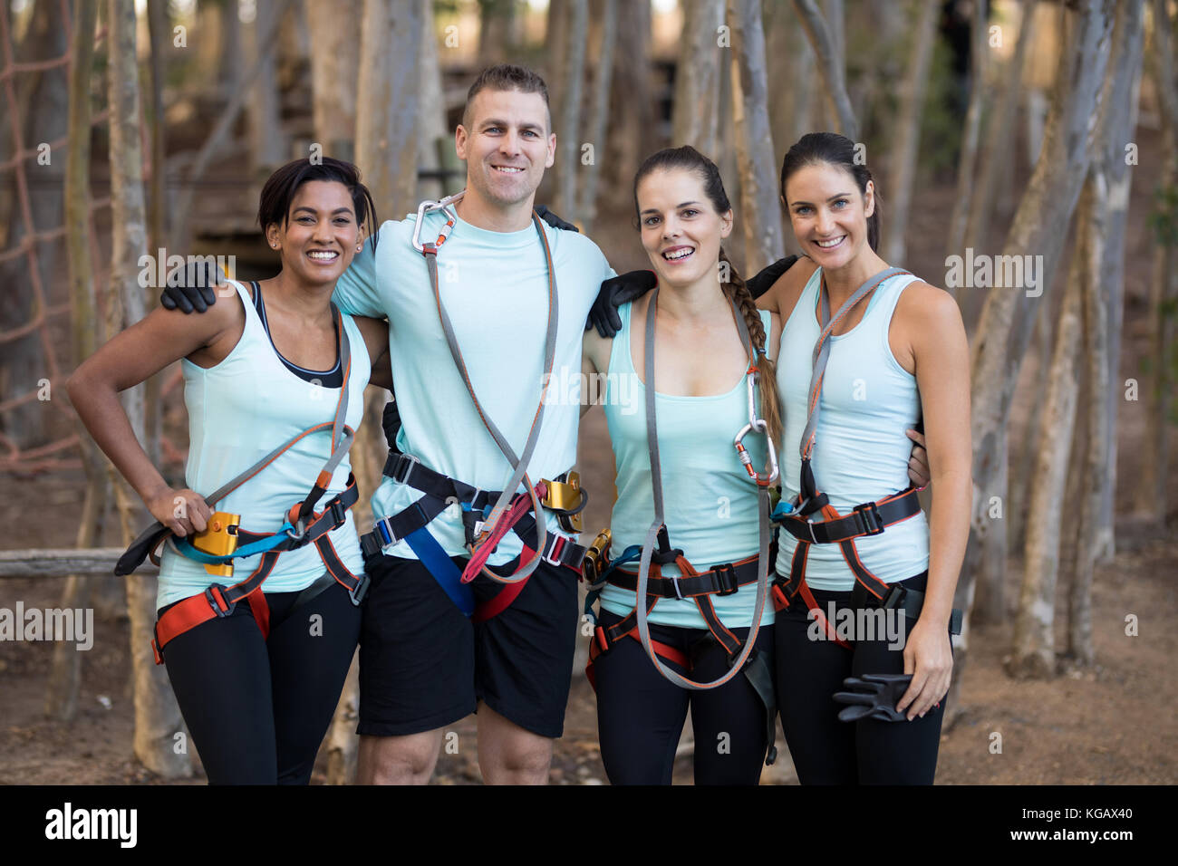 Portrait of fit friends wearing harness Stock Photo - Alamy