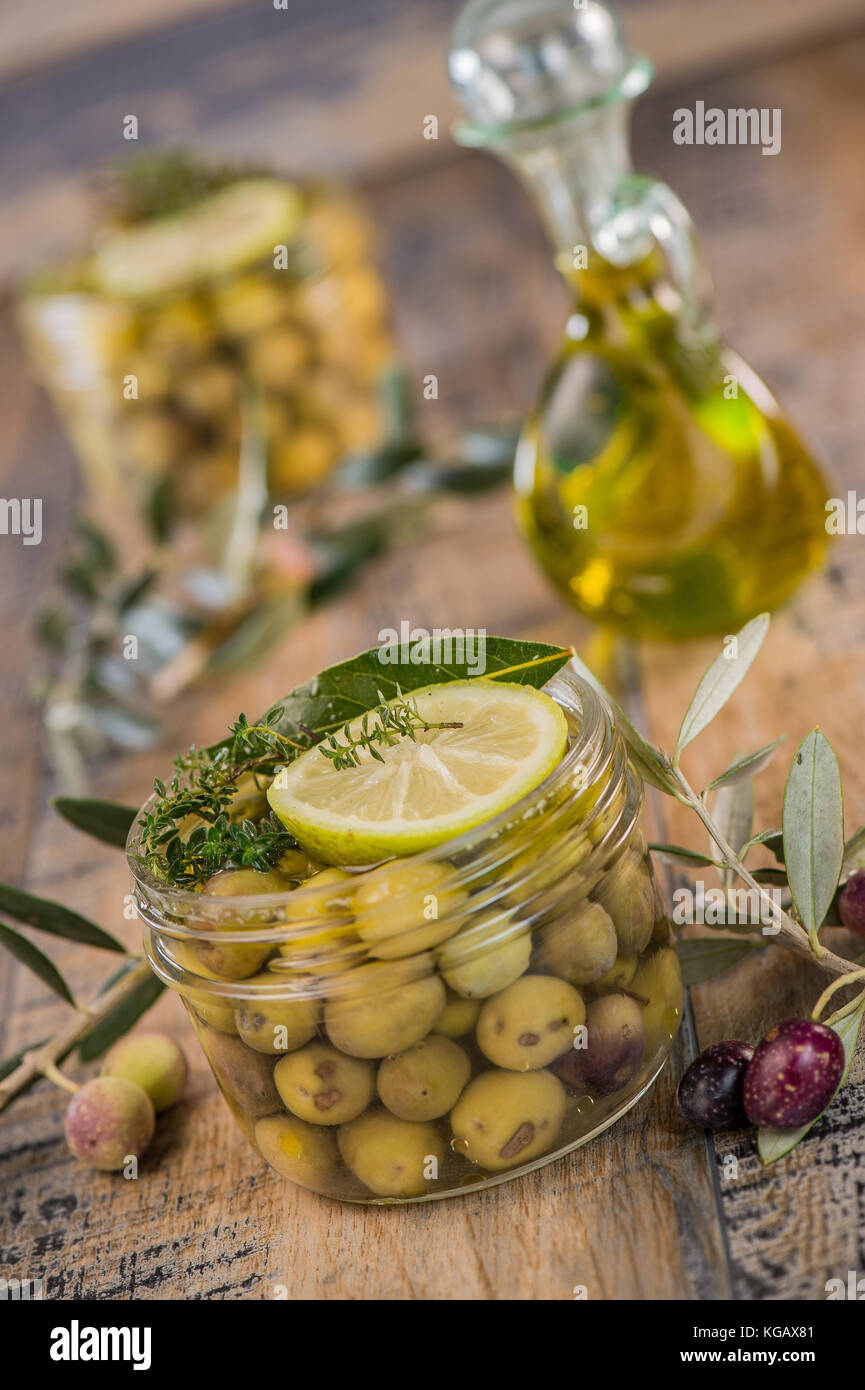 Green olives preserved in jar, preserve Stock Photo - Alamy
