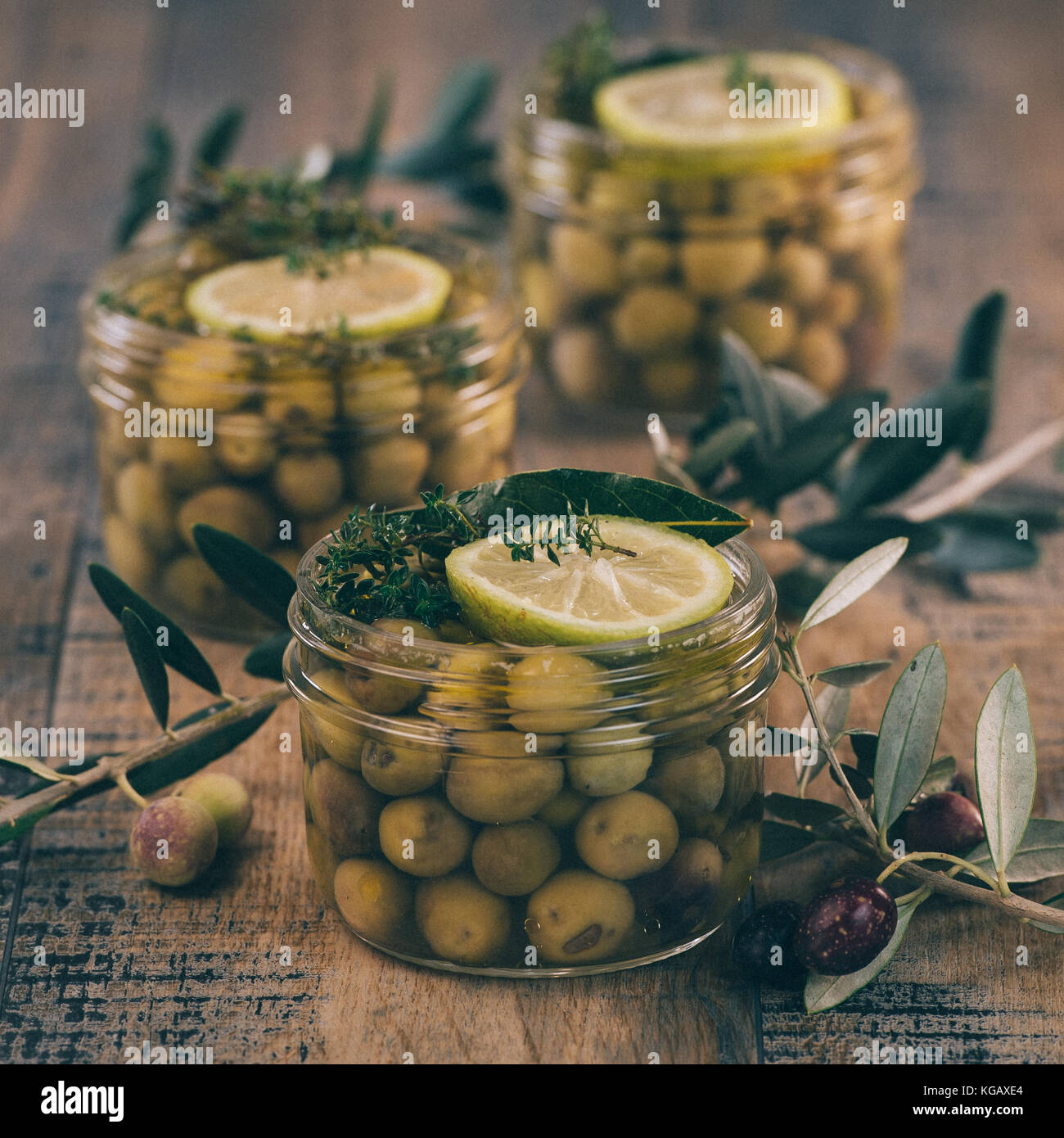 Green olives preserved in jar, preserve Stock Photo - Alamy