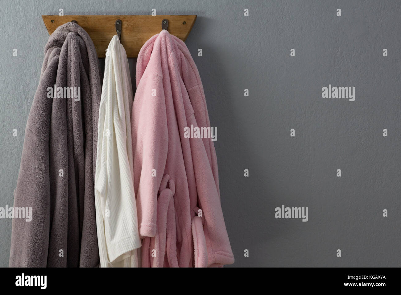 Bathrobes hanging hi-res stock photography and images - Alamy