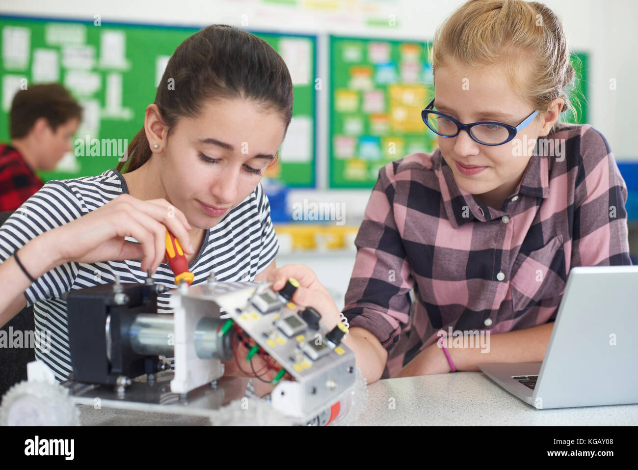 Female Pupils In Science Lesson Studying Robotics Stock Photo - Alamy
