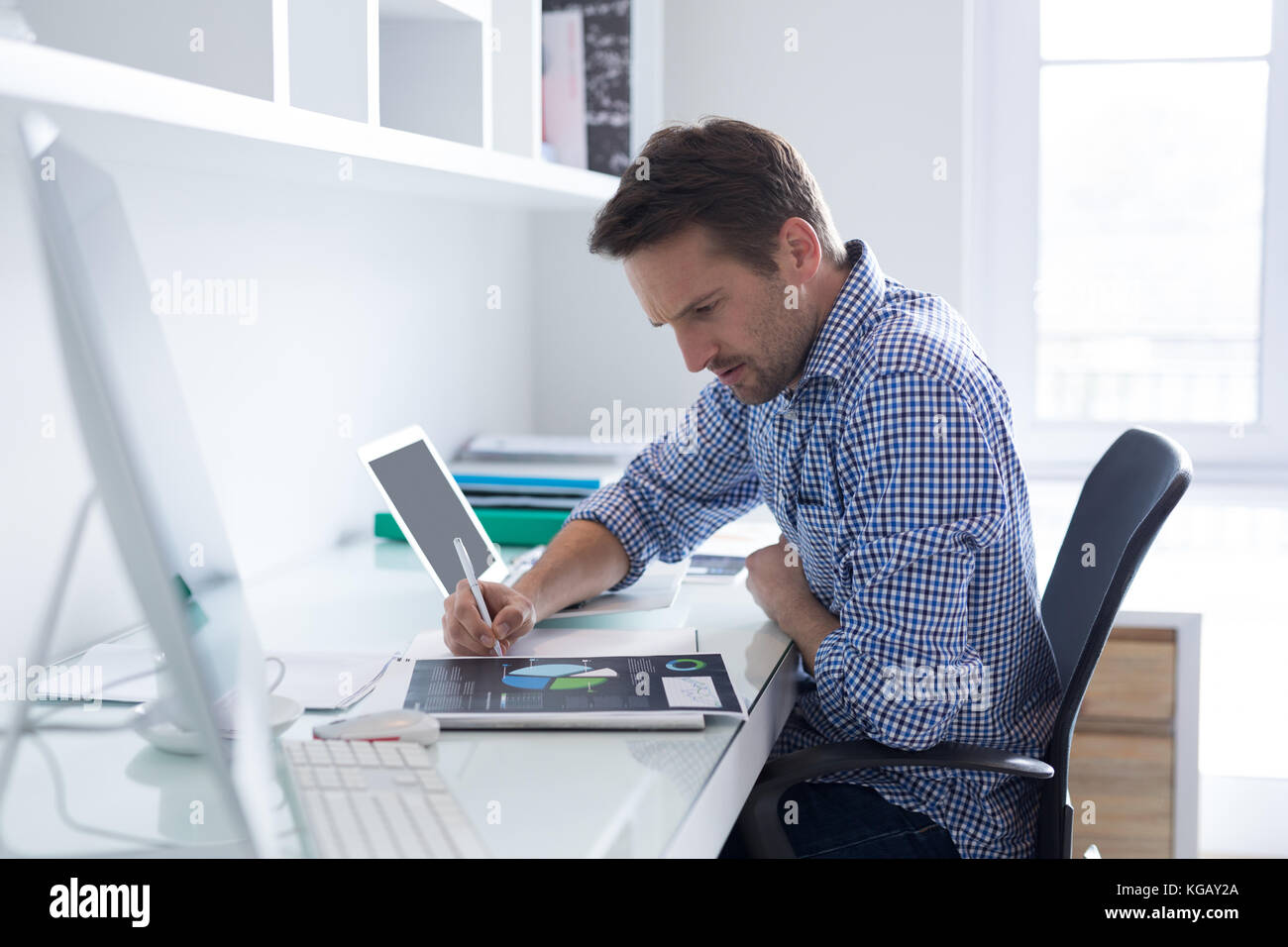 Attentive analysis hi-res stock photography and images - Alamy