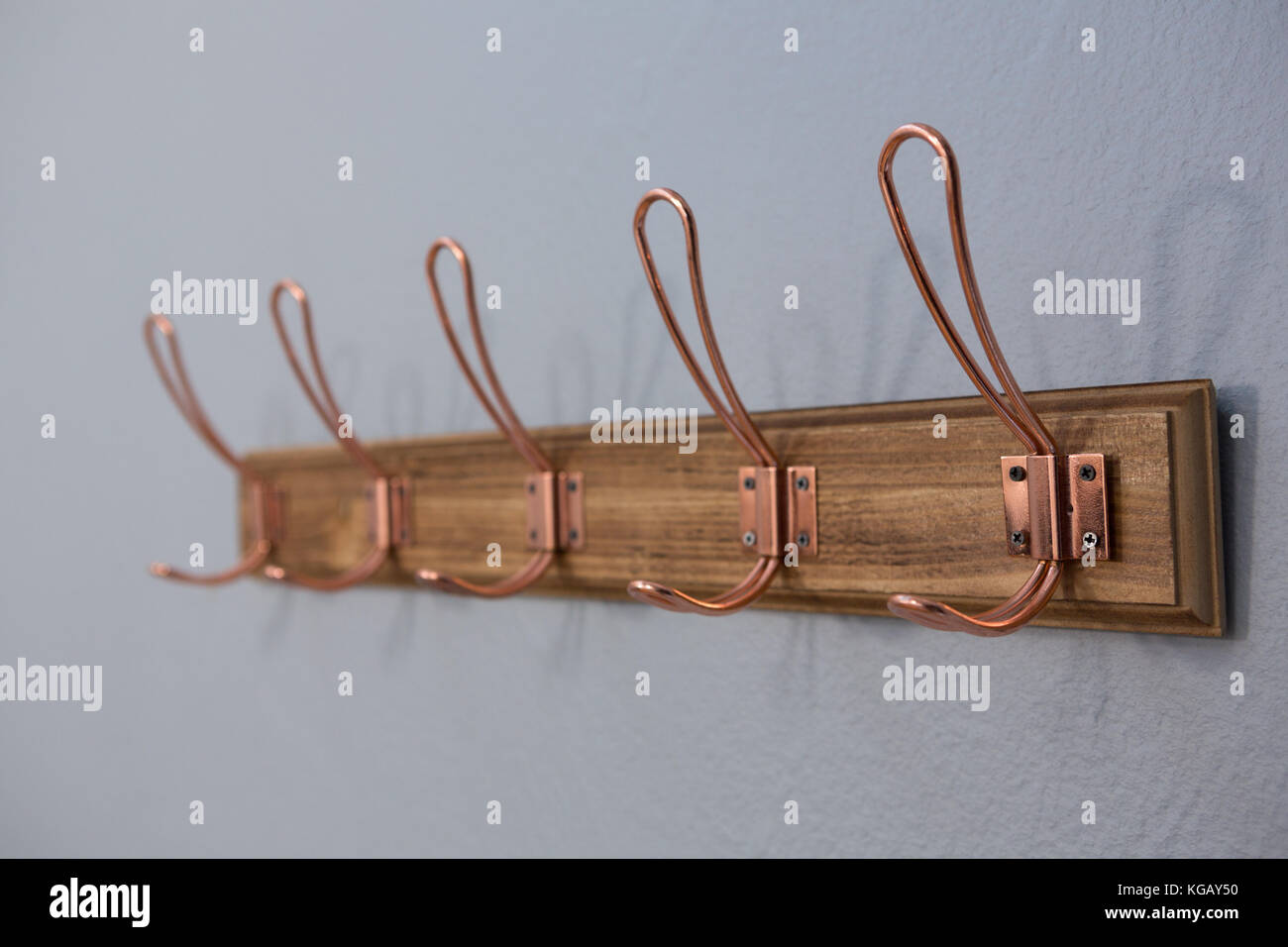 Close-up of hook attached on wall Stock Photo - Alamy