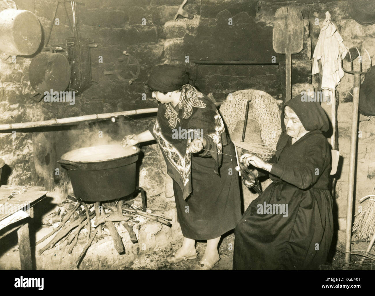 Traditional extraction of silk from boiling the silkworm cocoon, Sicily ...