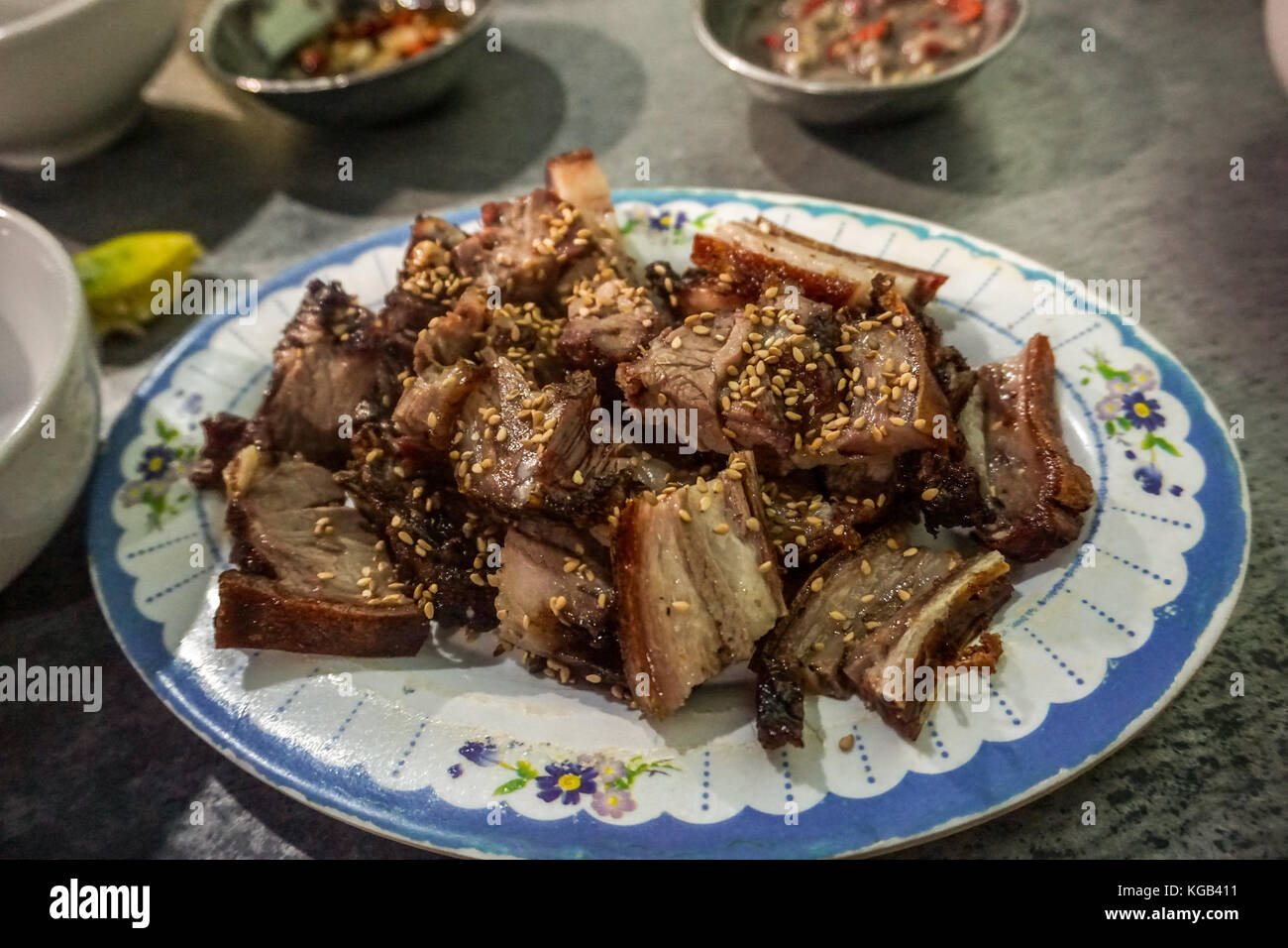 Asian eating dog meat hi-res stock photography and images - Alamy
