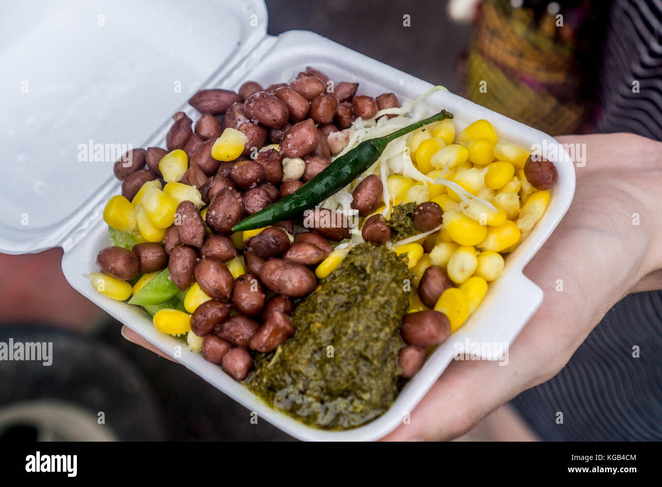 Street food in Yangon, Myanmar - Beans, corn, pepper chutney, lime ...