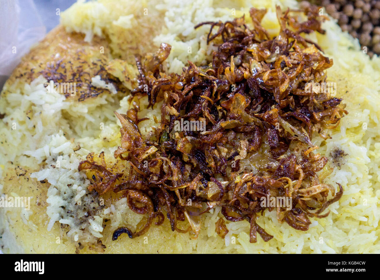 Street food in Yangon, Myanmar - sticky rice with fried onions and ...
