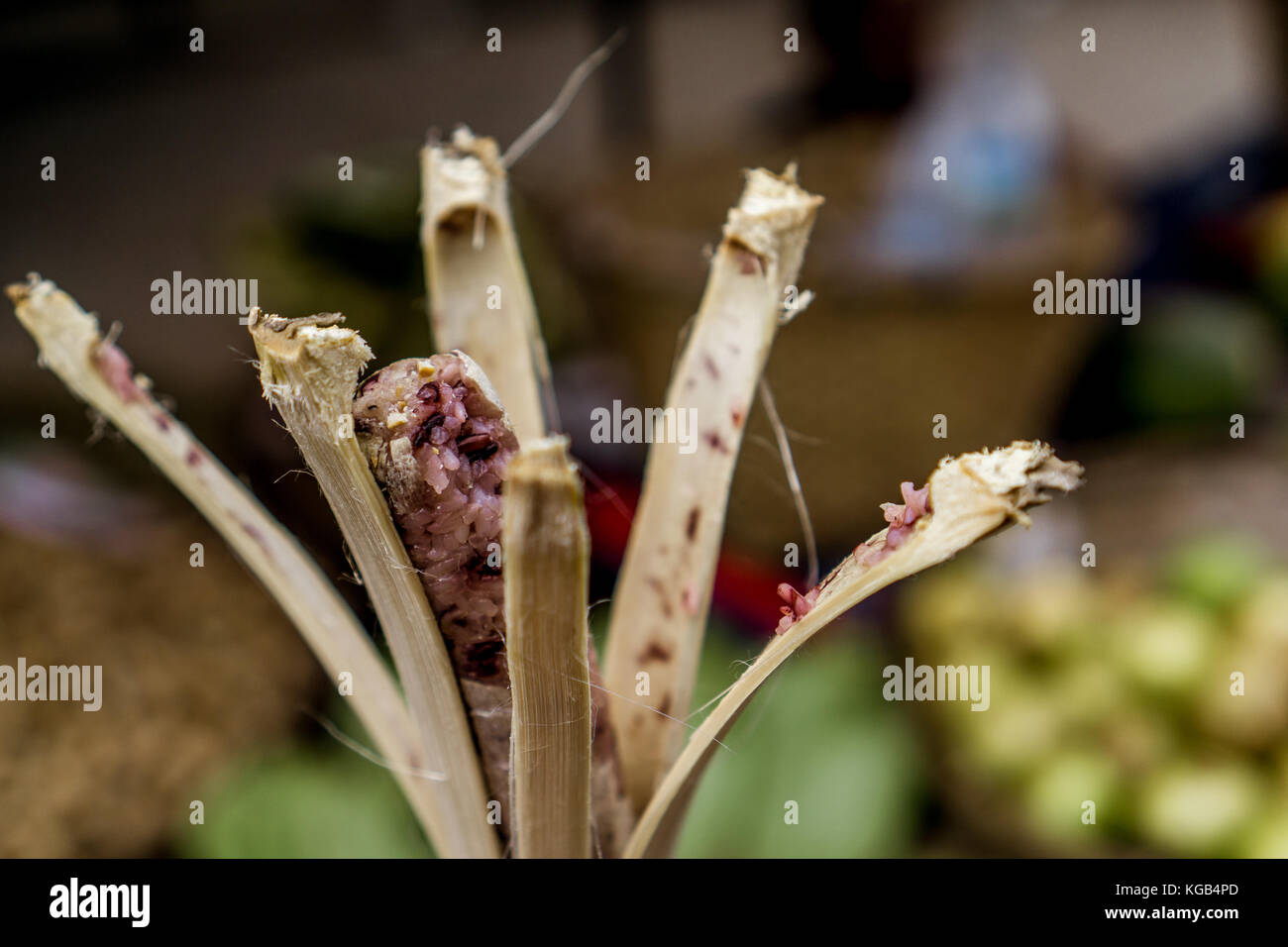 Mandalay, Myanmar - sticky rice in bamboo at street market Stock Photo ...