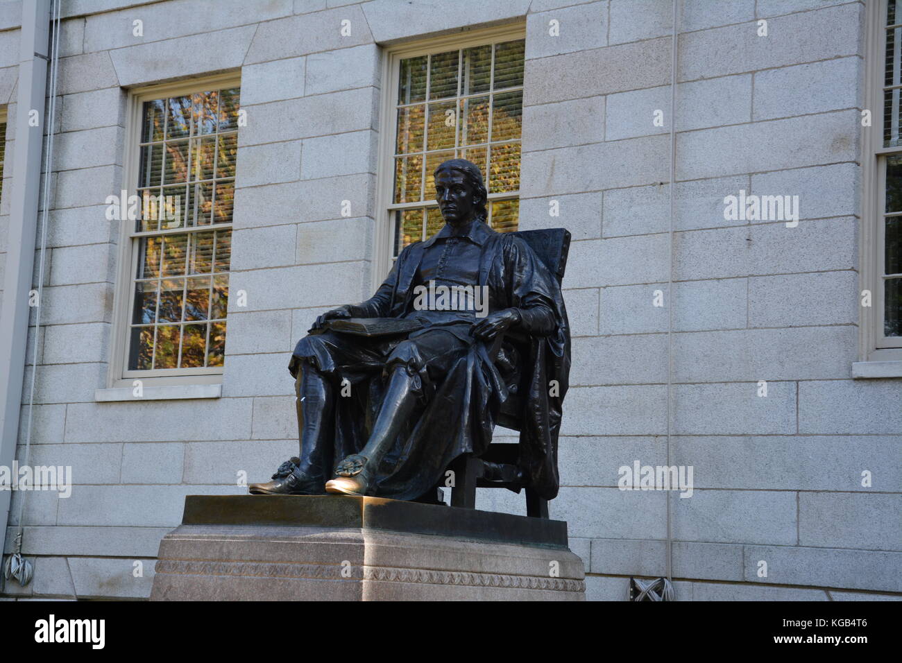 The famous John Harvard statue in Harvard Yard at Harvard University in ...