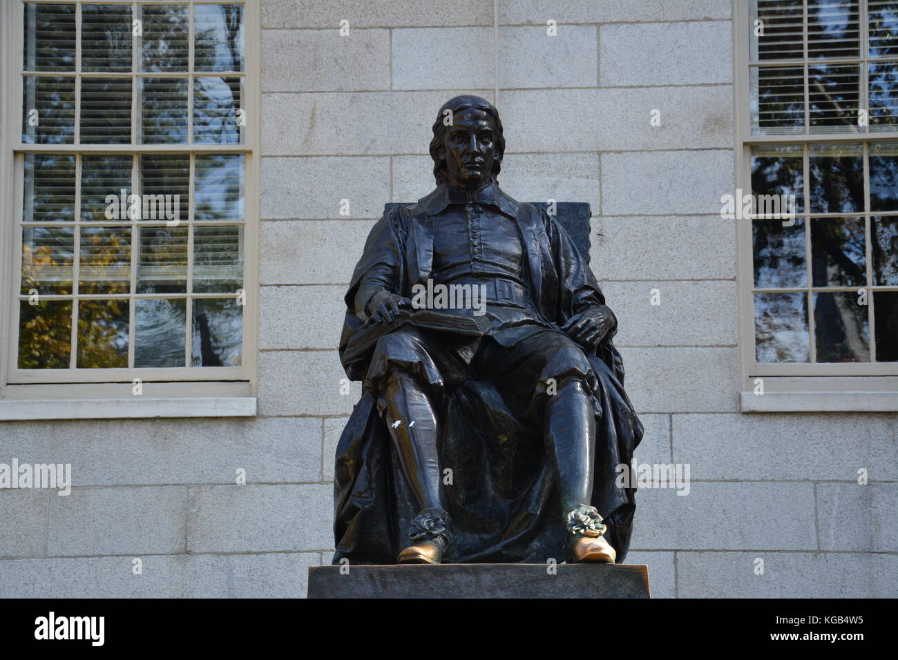 The famous John Harvard statue in Harvard Yard at Harvard University in ...