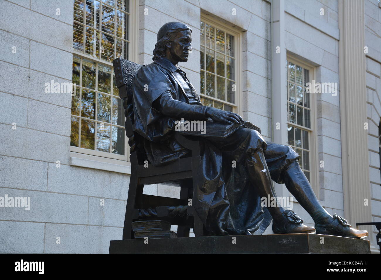 The famous John Harvard statue in Harvard Yard at Harvard University in ...