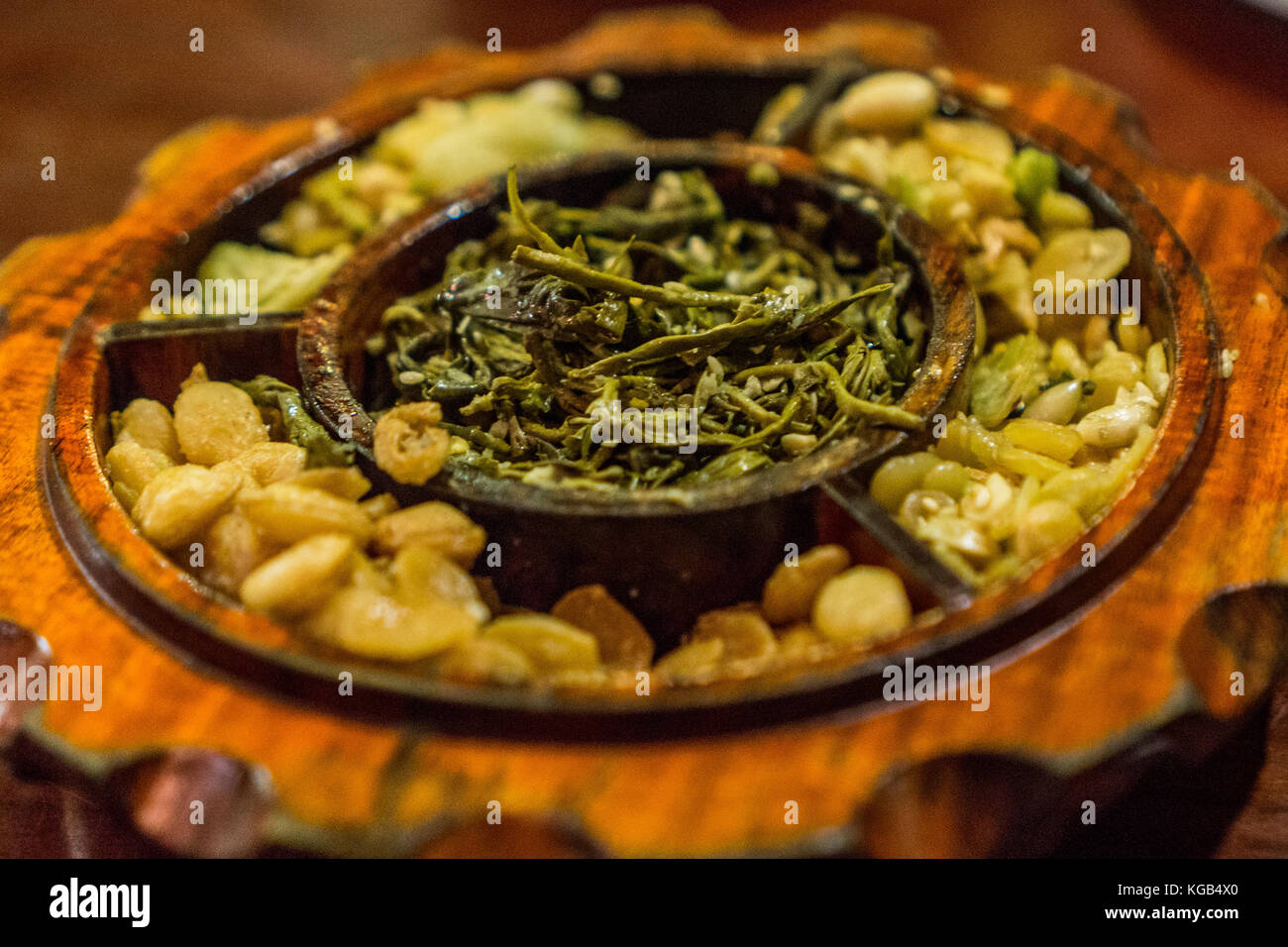 Mandalay, Myanmar - burmese food - fermented tea leaves and peanuts ...