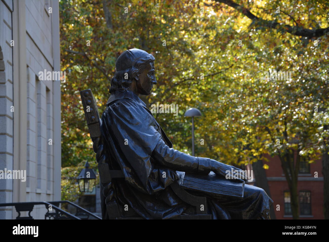 The famous John Harvard statue in Harvard Yard at Harvard University in ...