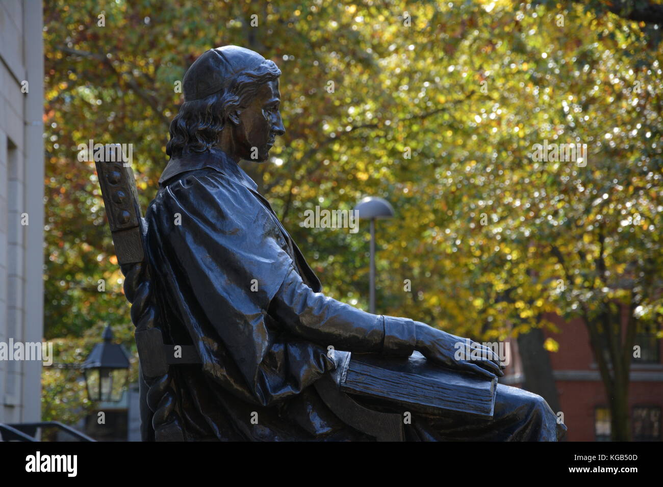 The famous John Harvard statue in Harvard Yard at Harvard University in ...