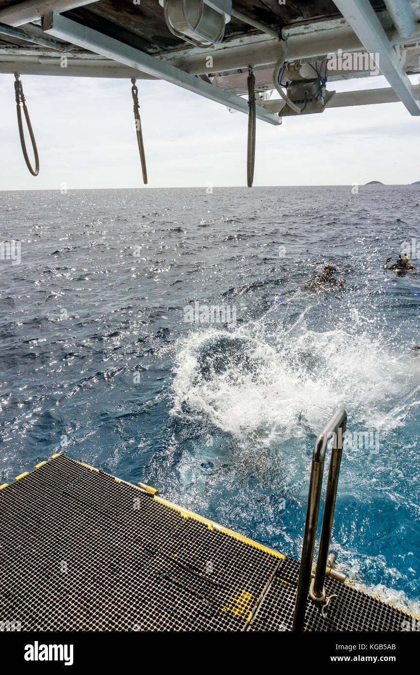 Similan Island, Thailand 3 day liveaboard SCUBA trip - jumping in Stock ...