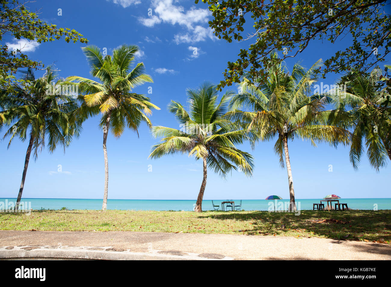 dining table on the beach waiting for the tourist Stock Photo - Alamy