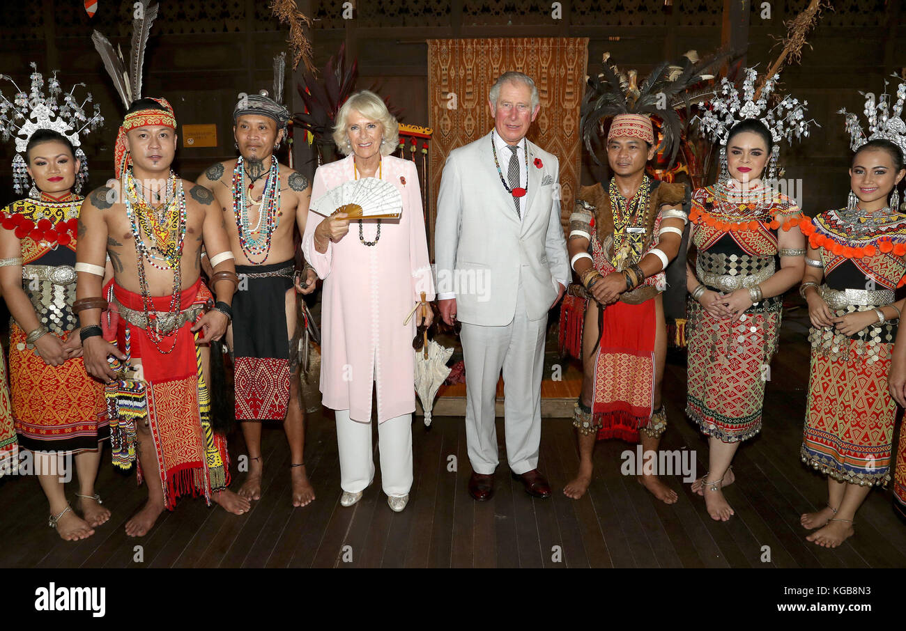 The Prince of Wales and Duchess of Cornwall pose for photographs with ...