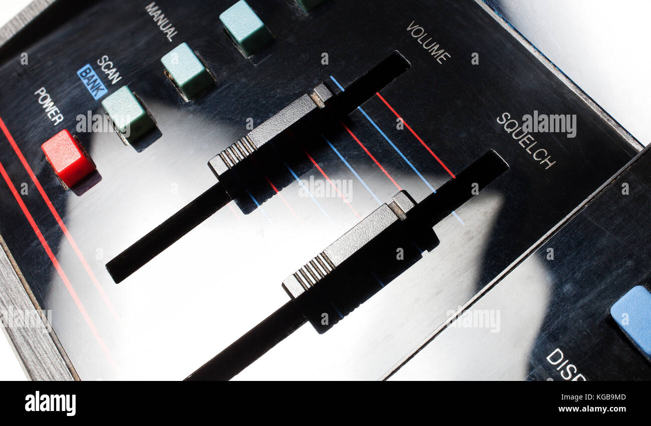 Sliders used to adjust volume and squelch on an old radio Stock Photo ...