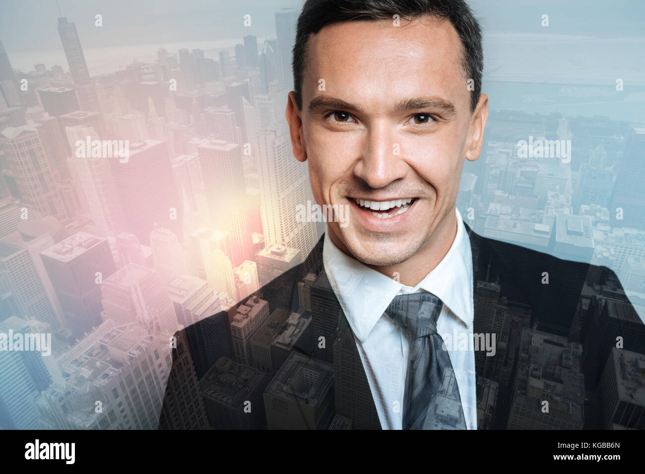 Portrait of a nice happy businessman Stock Photo - Alamy
