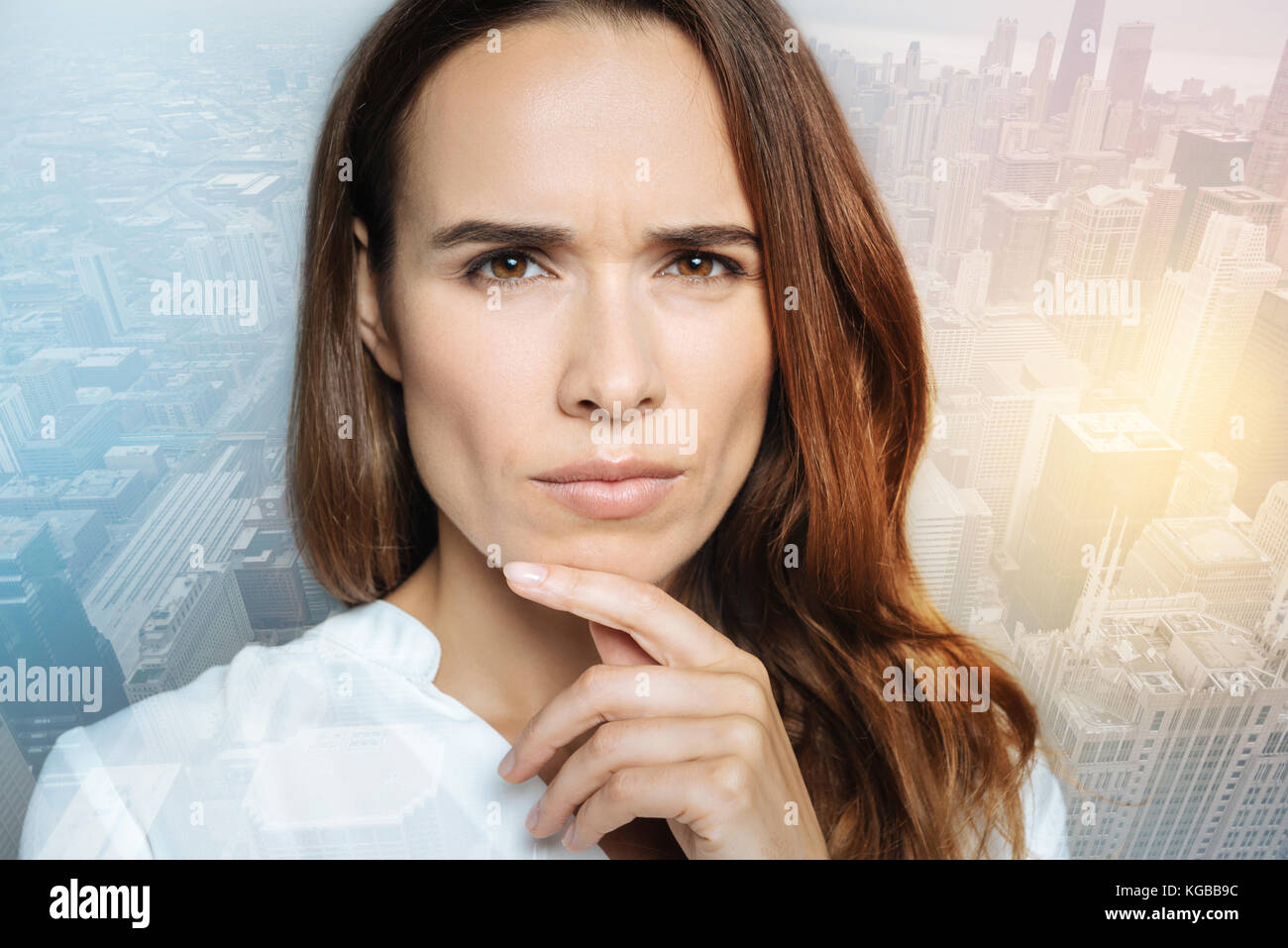 Portrait of a thoughtful young woman Stock Photo - Alamy Portrait of a thoughtful young woman Stock Photo - Alamy