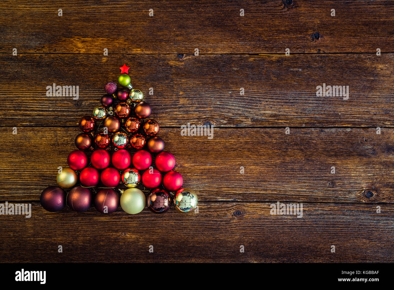 Christmas tree shaped design made from Christmas balls. Space for text ...