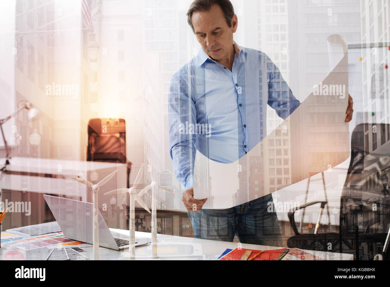 Concentrated eco engineer working on the project Stock Photo - Alamy