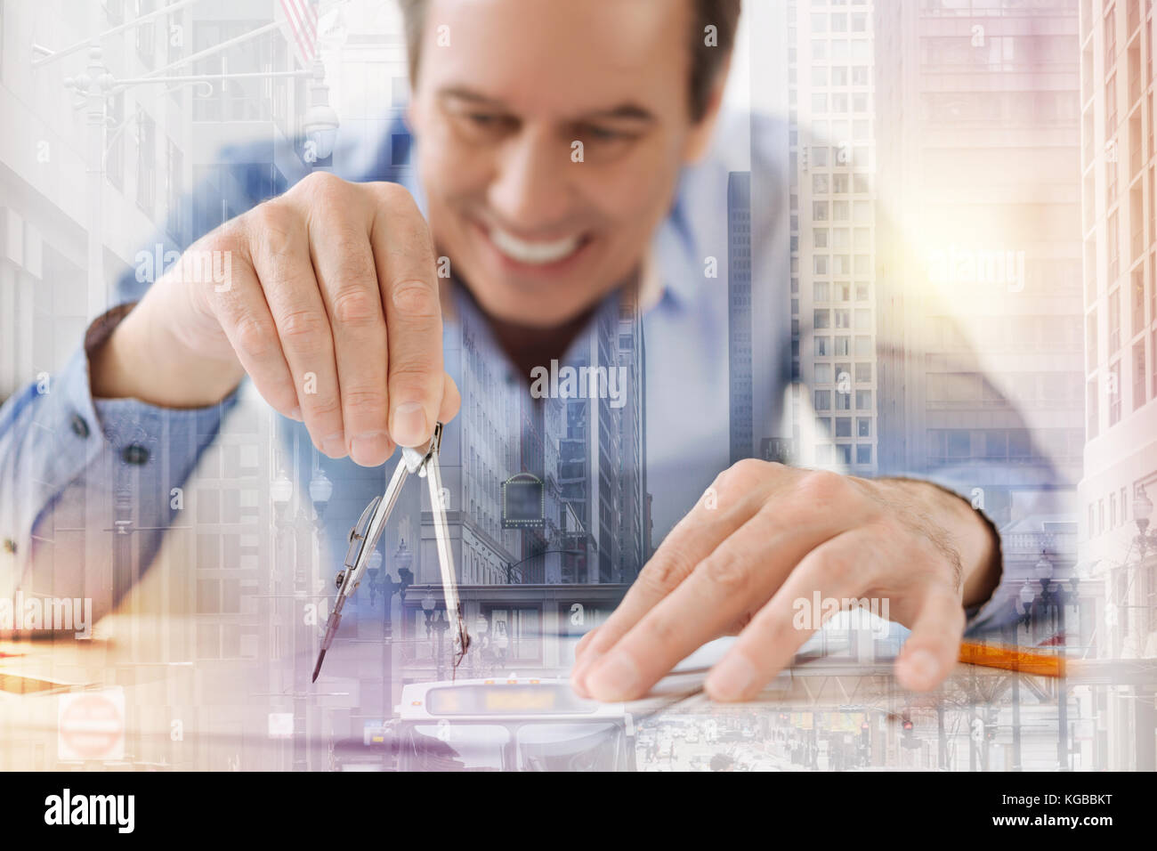 Pair of compasses in hands of a positive senior civil engineer Stock ...