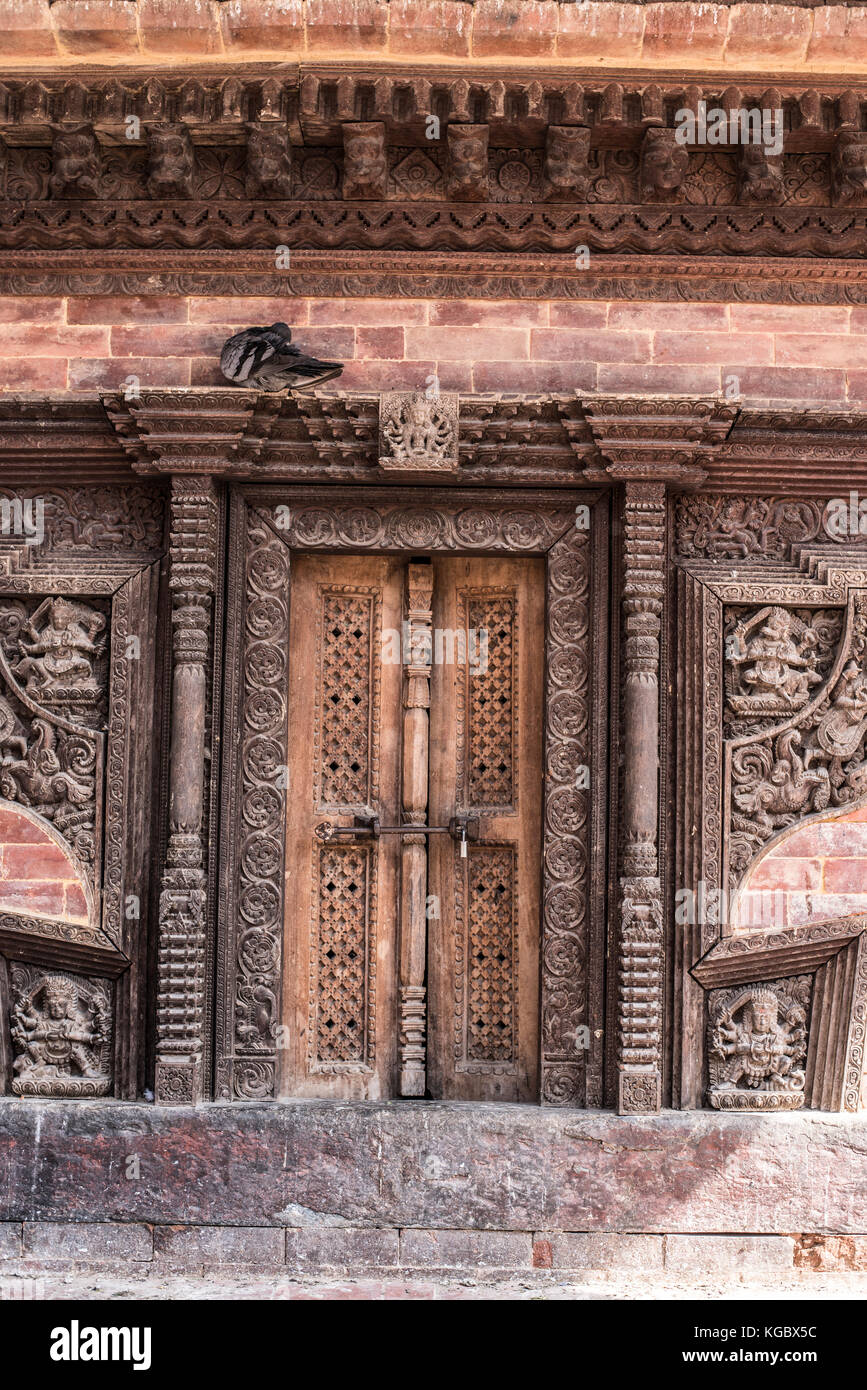 wooden traditional handcrafted window in the brick wallcarved Stock ...