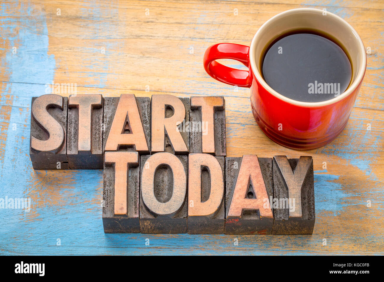 start today word abstract in vintage letterpress wood type with a cup ...