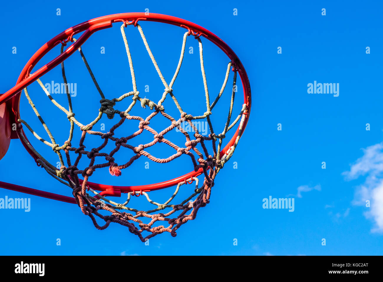 Basketball hoop outdoors, closeup, low angle view. Red basketball hoop ...