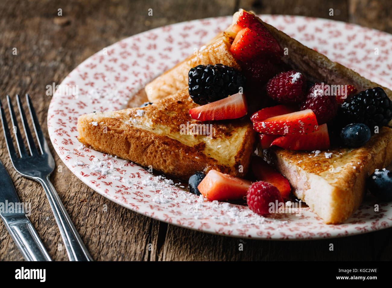 French toast on a vintage plate, rustic style Stock Photo - Alamy