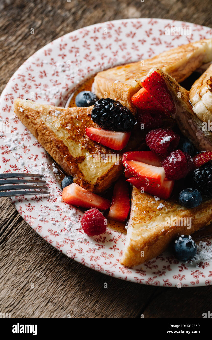 French toast on a vintage plate, rustic style Stock Photo - Alamy