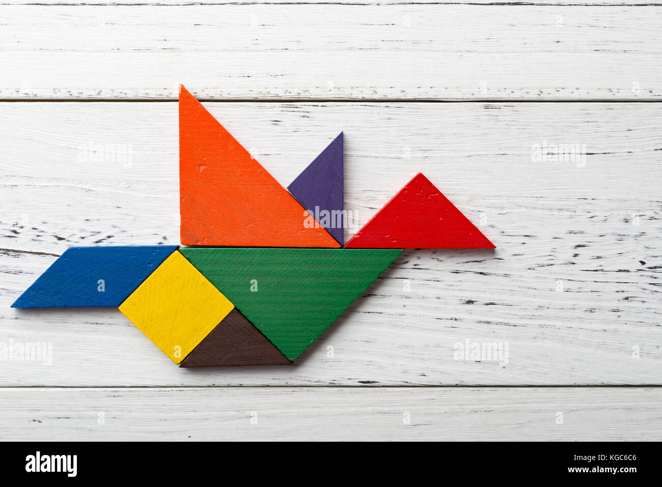 wooden tangram in a pigeon shape Stock Photo - Alamy