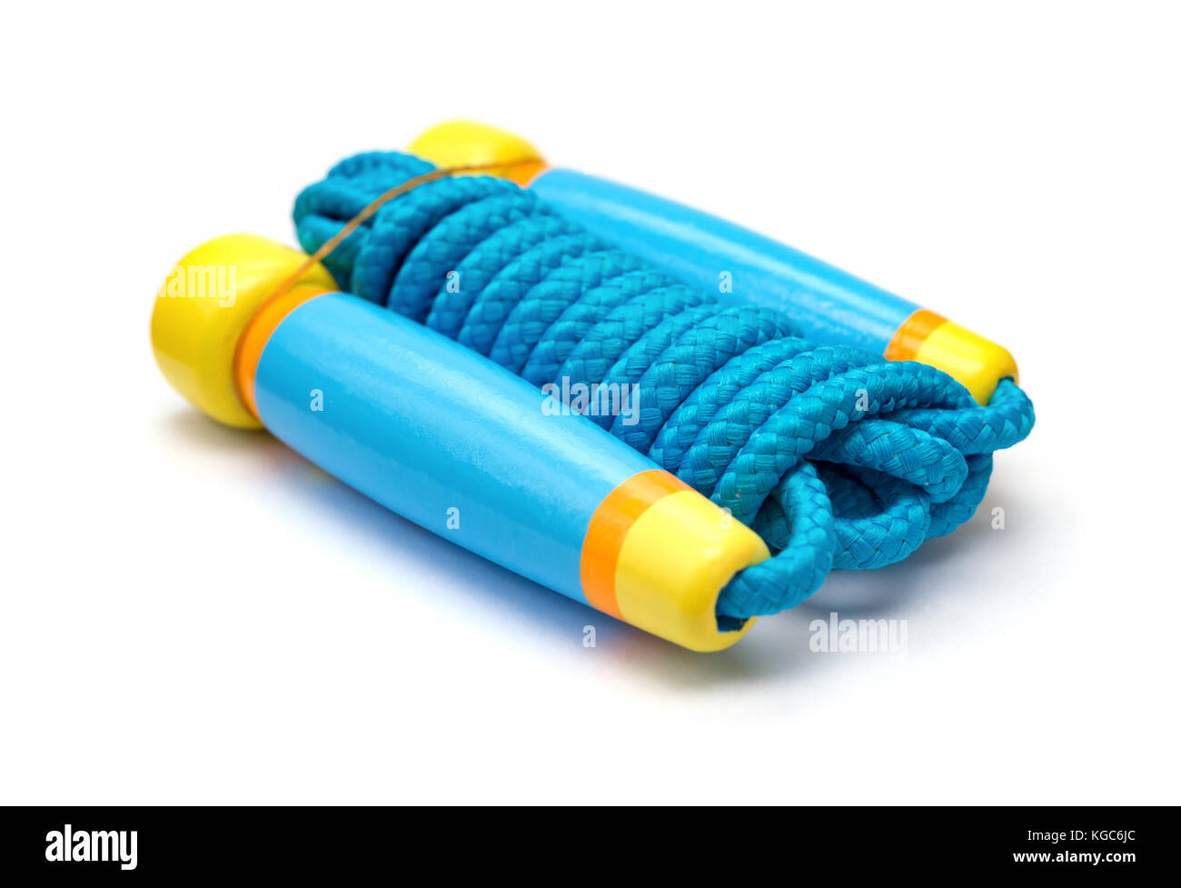 side view blue skipping rope with wooden handles on white background ...