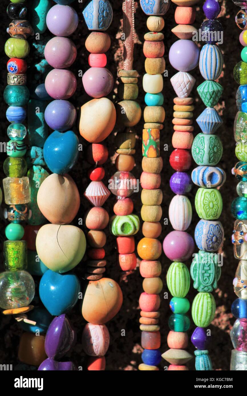 Bright and colorful beads hanging vertically Stock Photo - Alamy
