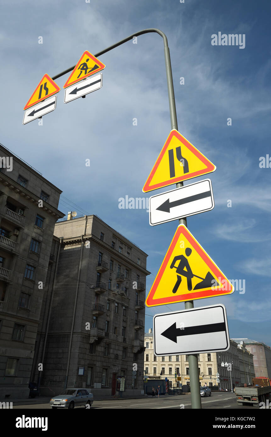 Road signs on the street as a warning to car drivers Stock Photo - Alamy