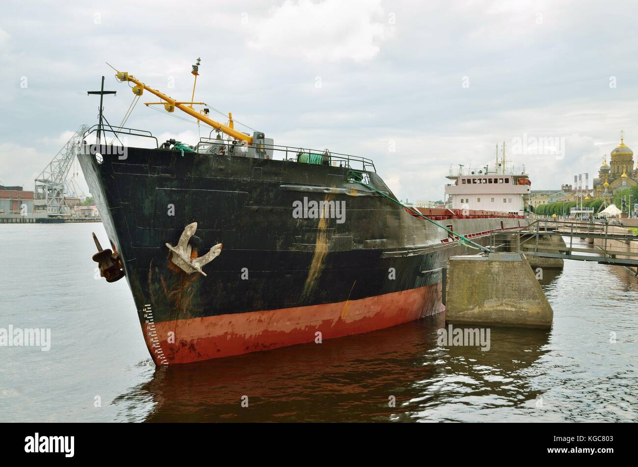 Cargo ship at berth.It is empty and will be loaded Stock Photo - Alamy