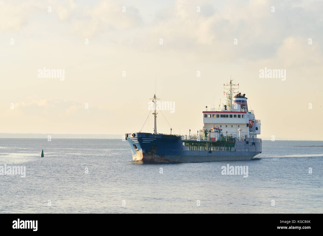 On the horizon the sea is visible floating tanker Stock Photo - Alamy