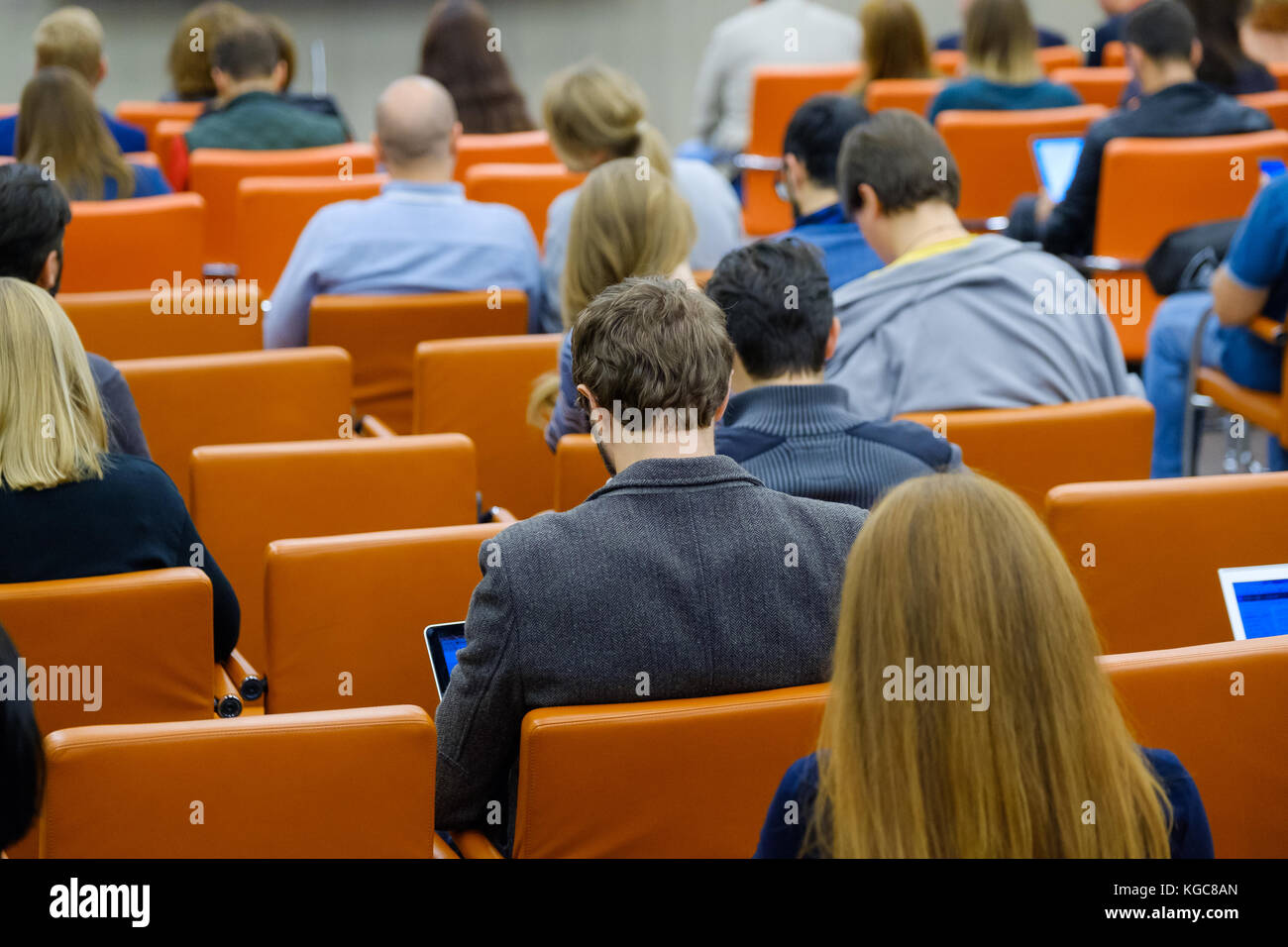 Audience listens to the lecturer Stock Photo - Alamy
