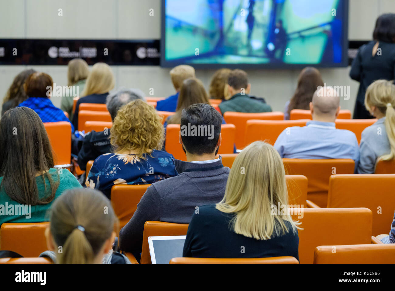 Audience listens to the lecturer Stock Photo - Alamy