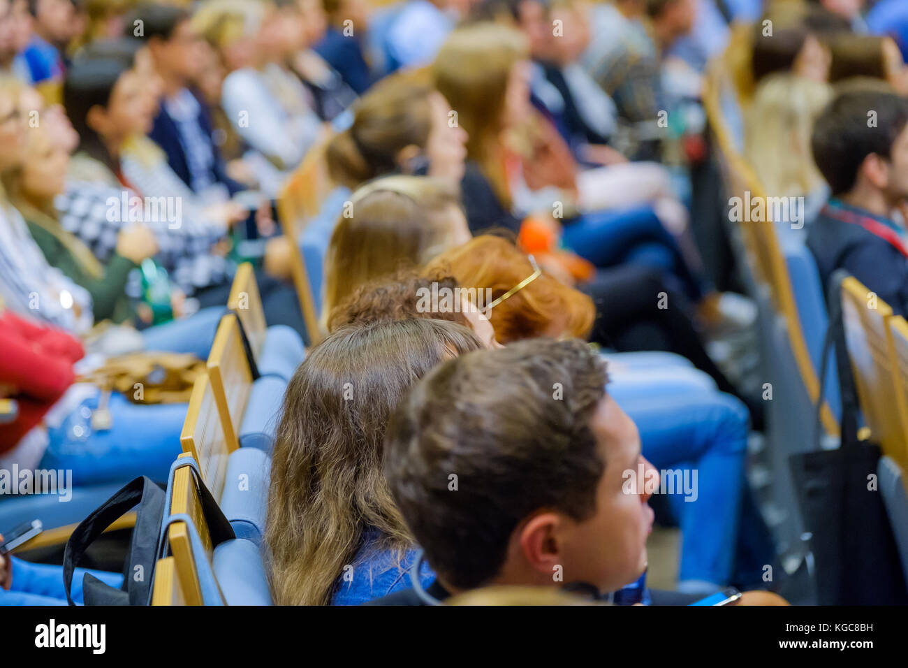 Audience listens to the lecturer Stock Photo - Alamy