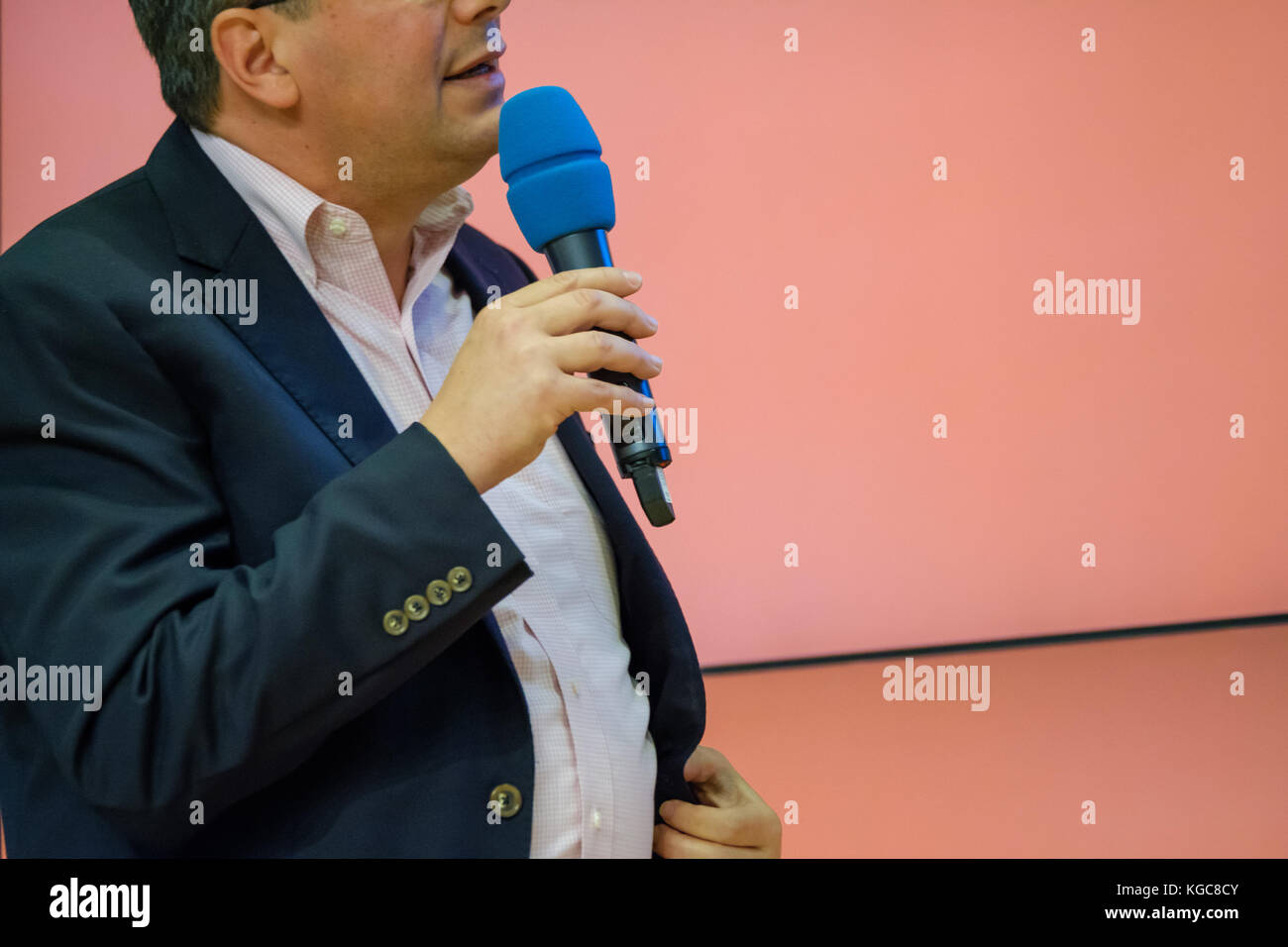 Man speaking at a conference Stock Photo - Alamy